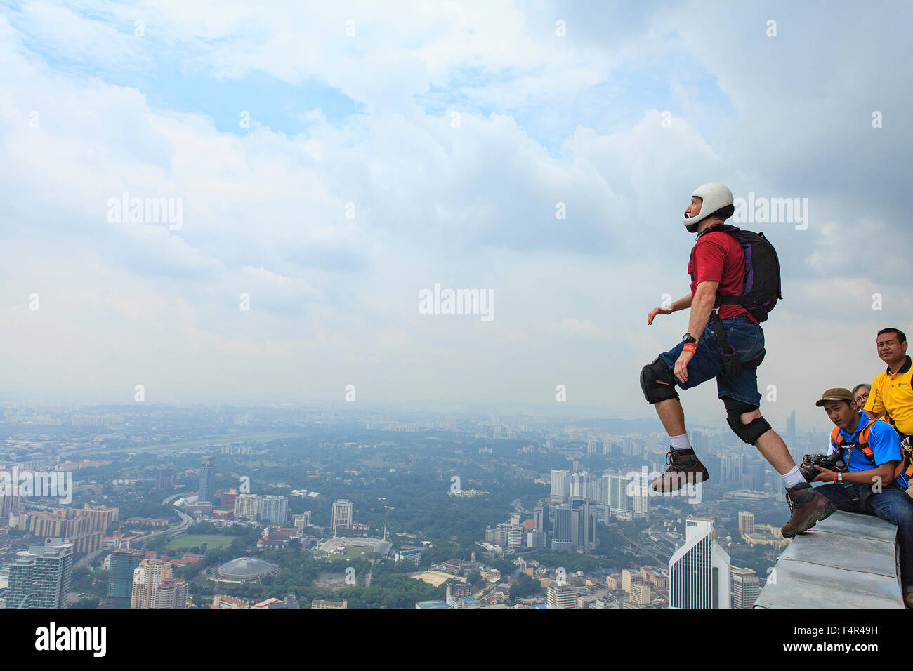 Kuala Lumpur, Malaysia-September 30, 2011: A BASE jumpers in jumps off ...
