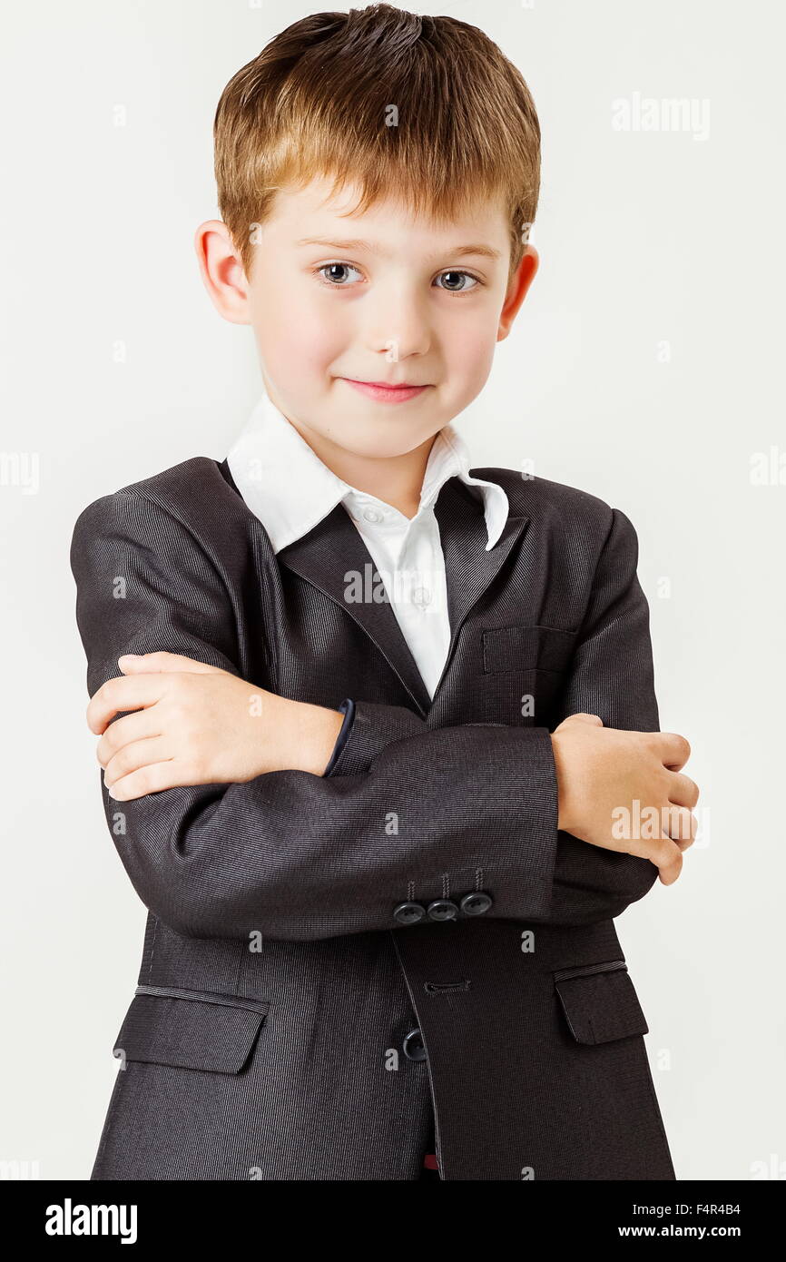 little boy with his arms folded Stock Photo - Alamy