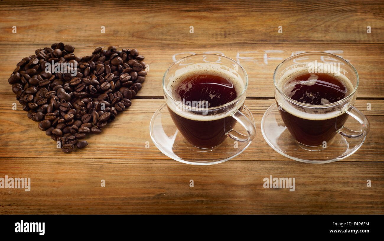 Two glass cups of coffee on a old wooden background. Top view Stock ...