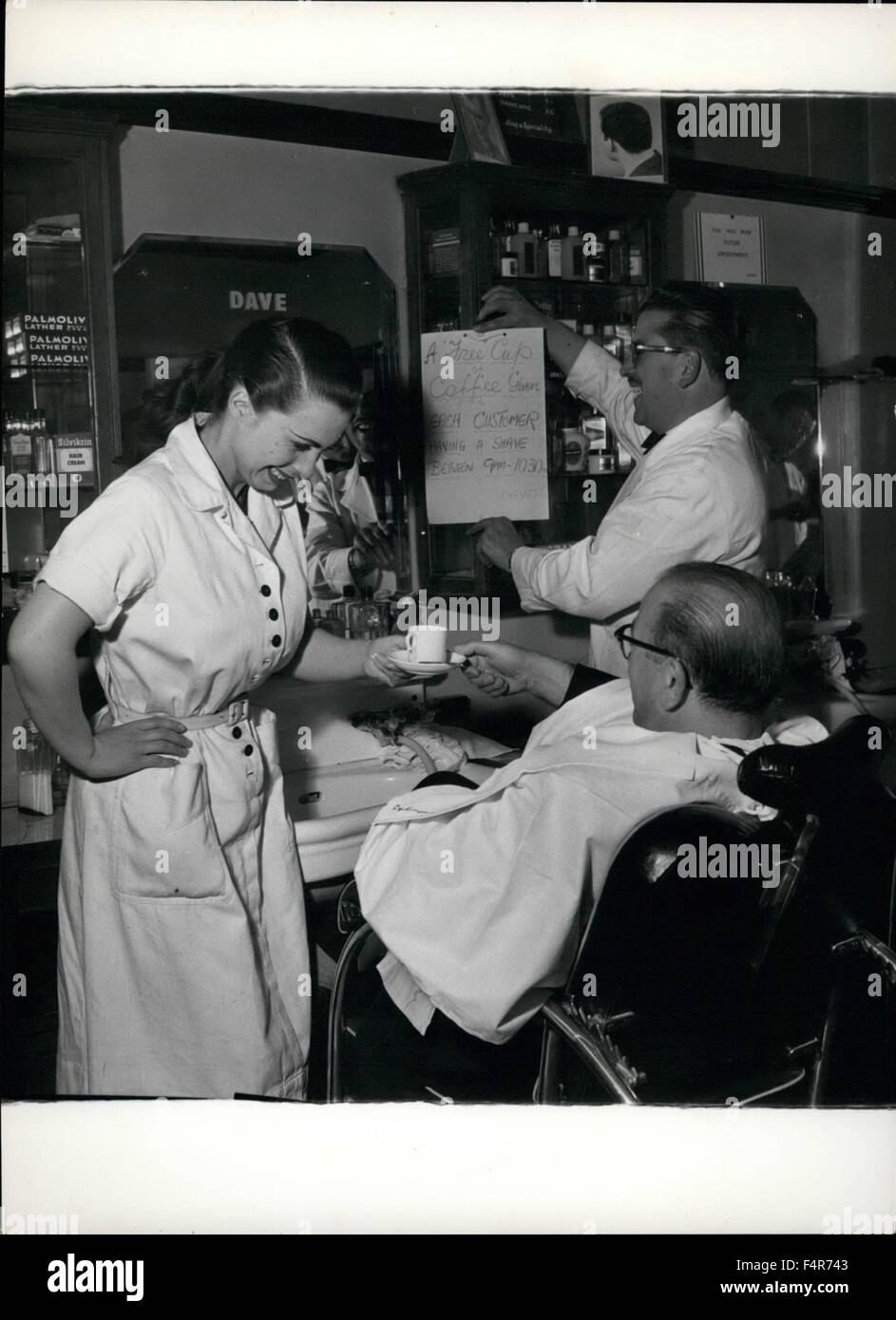 1965 - A Coffee Service At The N=Barber's Shop. A lady assistant serves ...