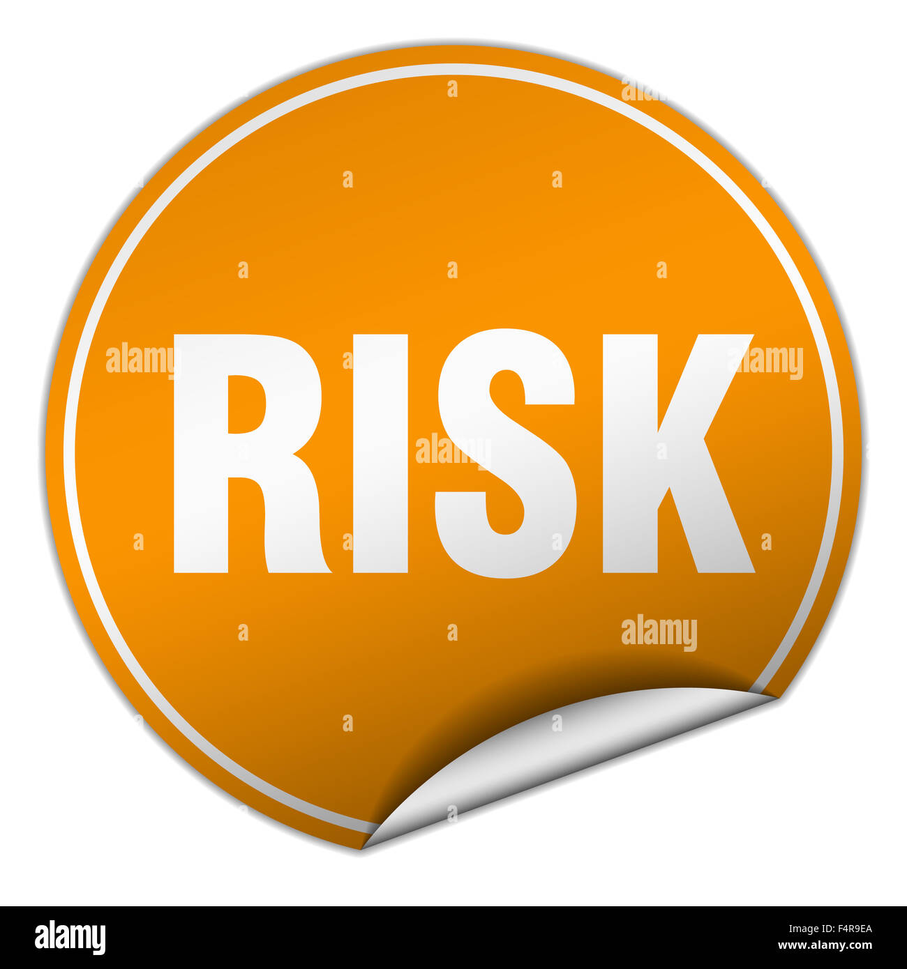 risk round orange sticker isolated on white Stock Photo - Alamy