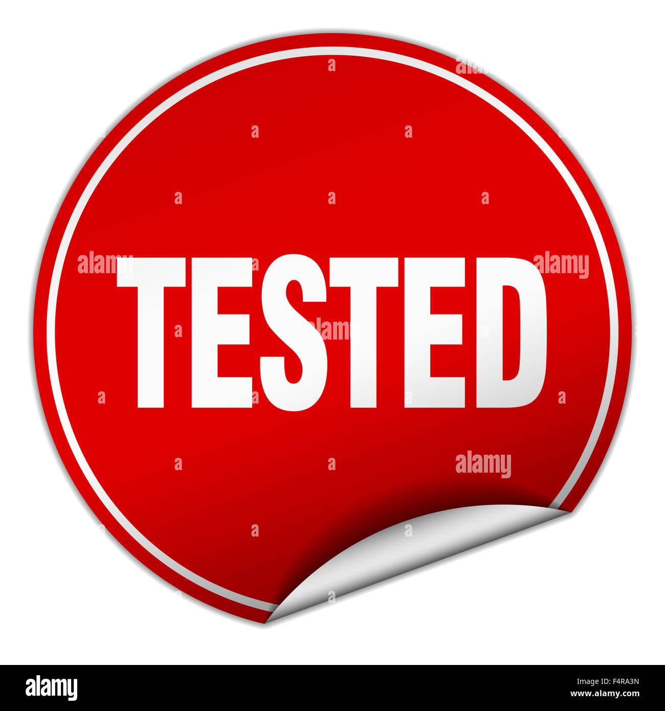 tested round red sticker isolated on white Stock Photo - Alamy