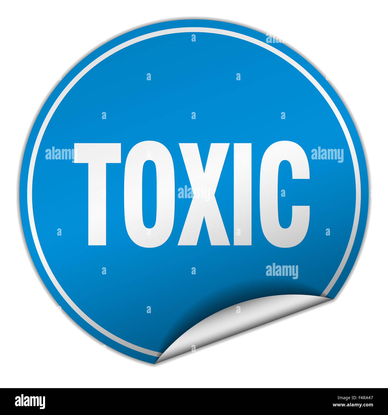 toxic round blue sticker isolated on white Stock Photo - Alamy