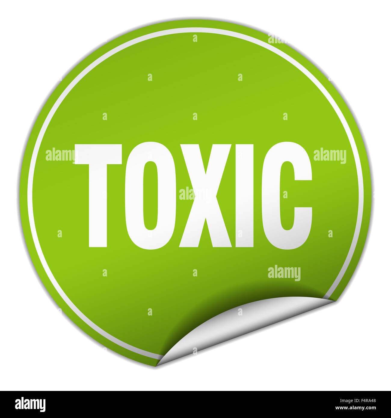 toxic round green sticker isolated on white Stock Photo - Alamy