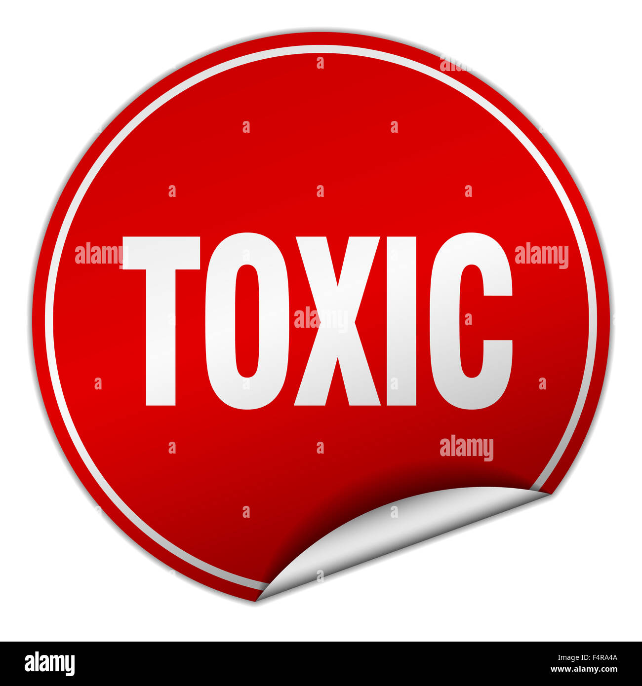 toxic round red sticker isolated on white Stock Photo - Alamy