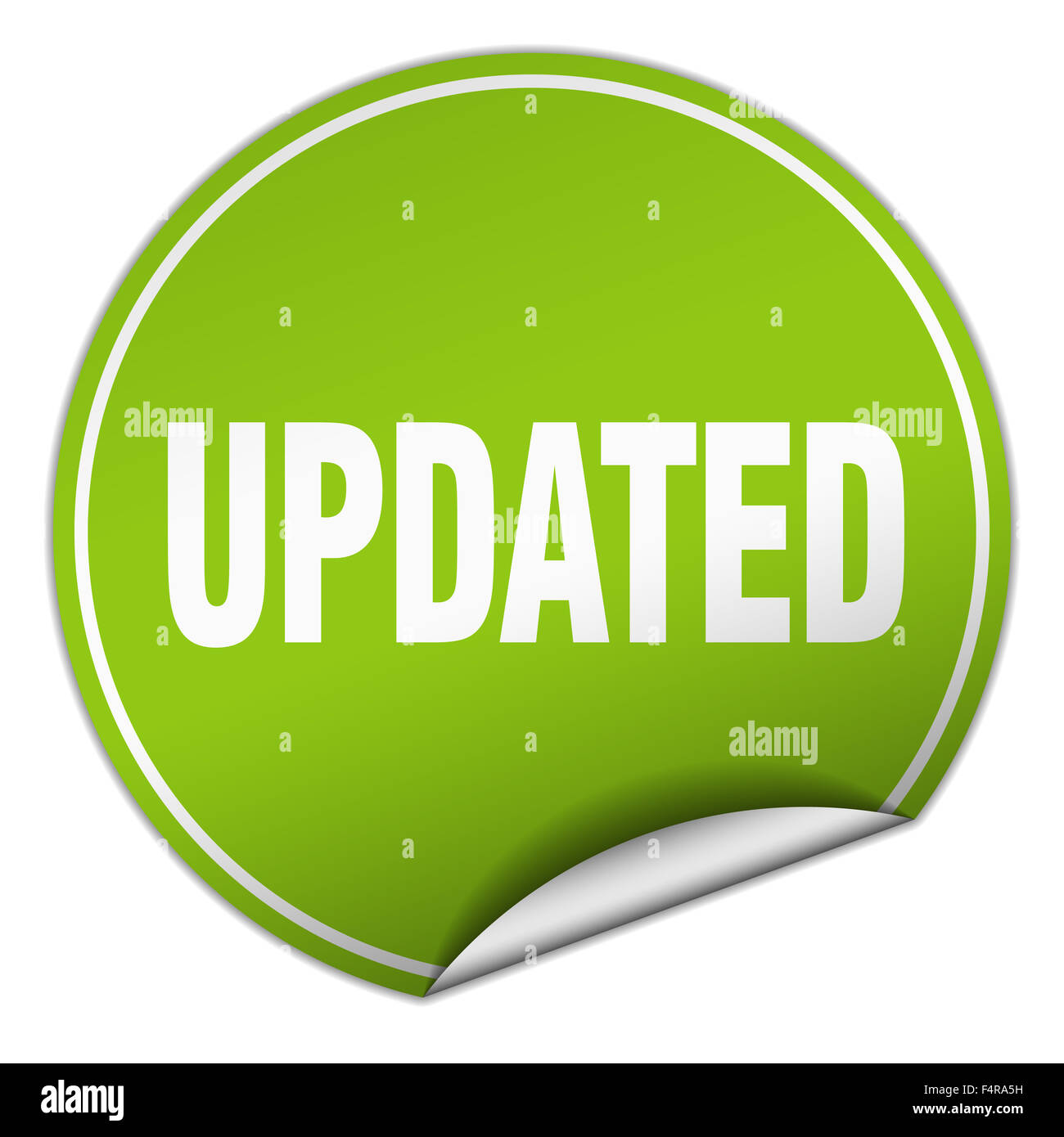 updated round green sticker isolated on white Stock Photo - Alamy