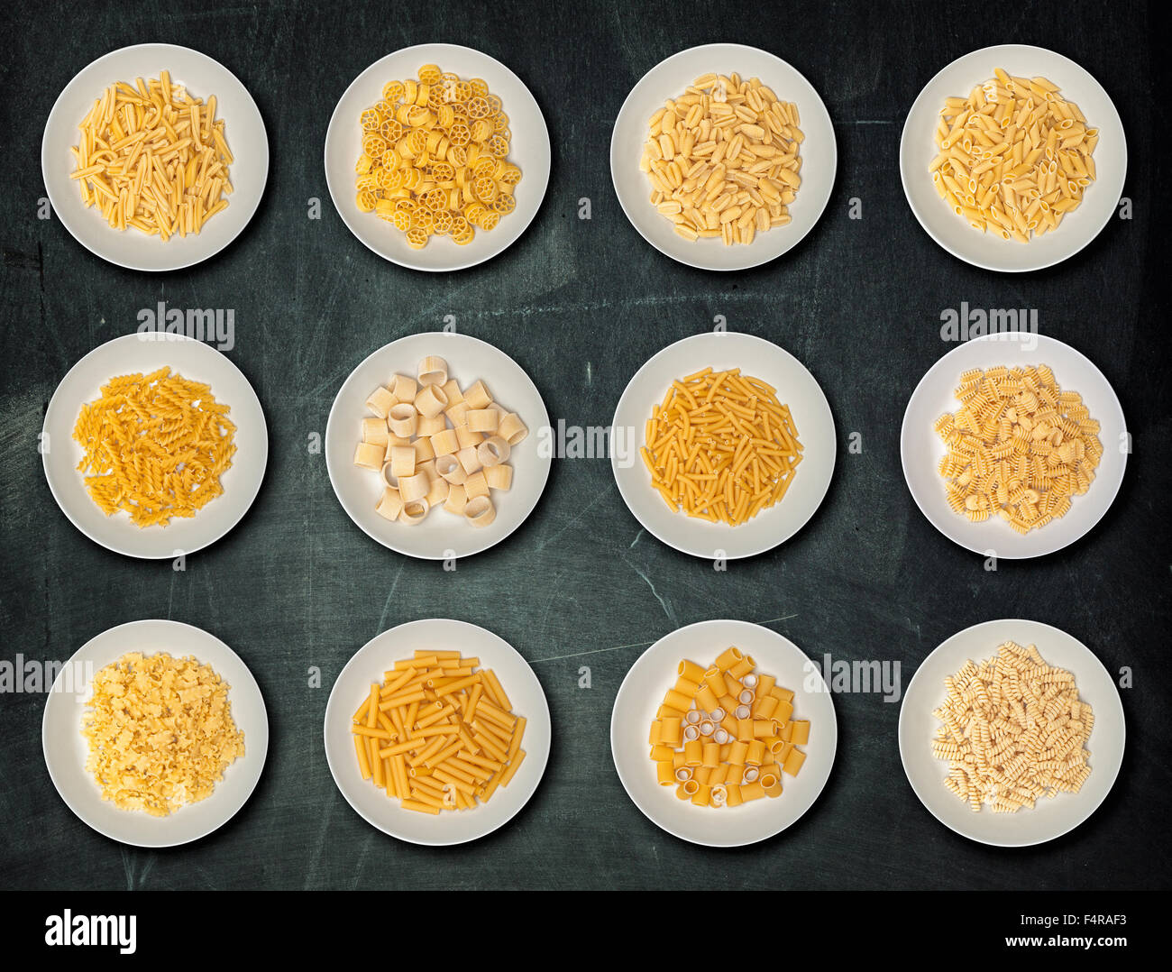 food background different kind of italian pasta Stock Photo - Alamy