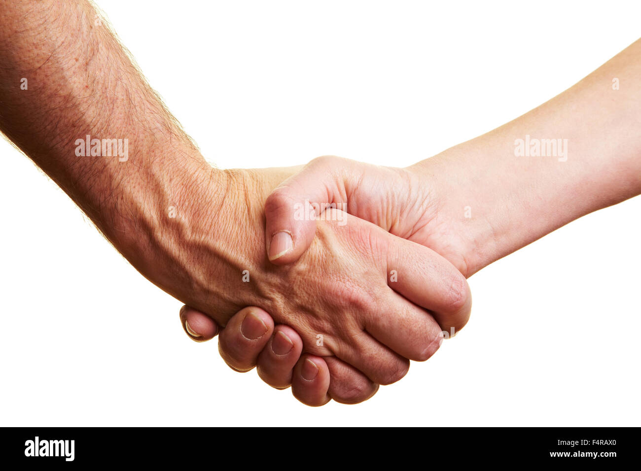 Two people shaking their hands Stock Photo - Alamy