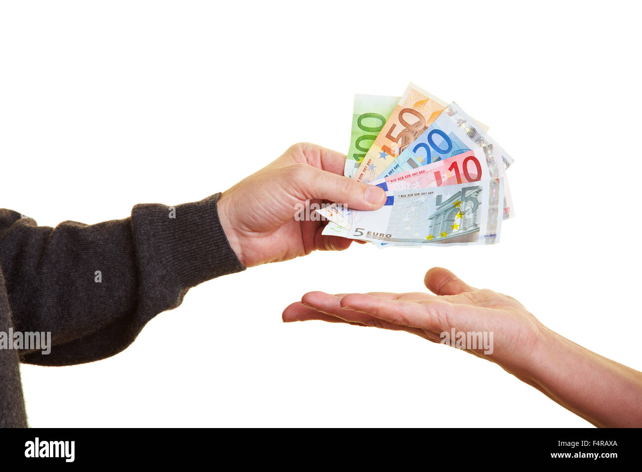 Hand handing over Euro banknotes to other hand Stock Photo - Alamy