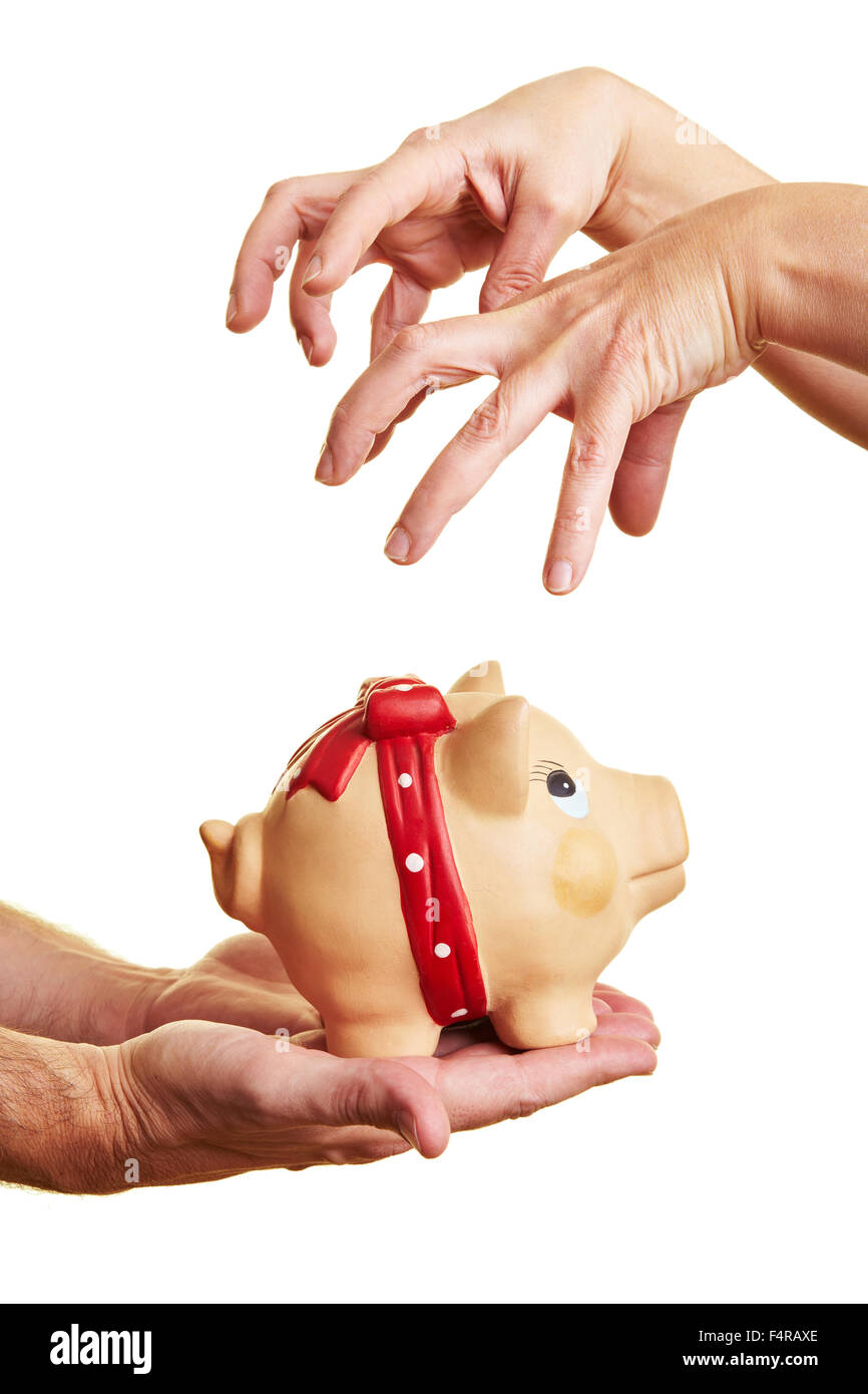 Greedy hands reaching for a piggy bank Stock Photo - Alamy
