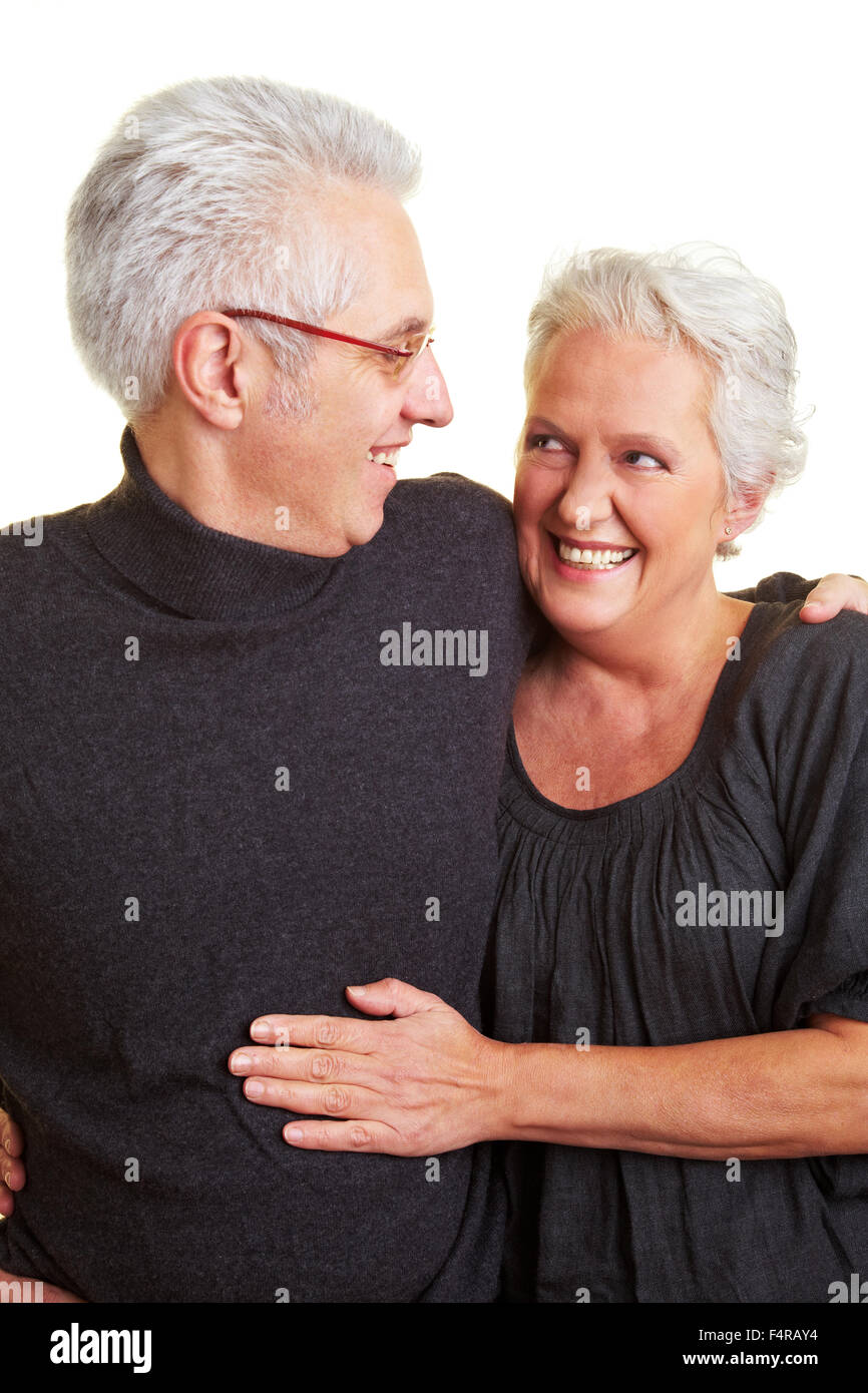 Happy senior citizen couple with grey hair embracing Stock Photo - Alamy