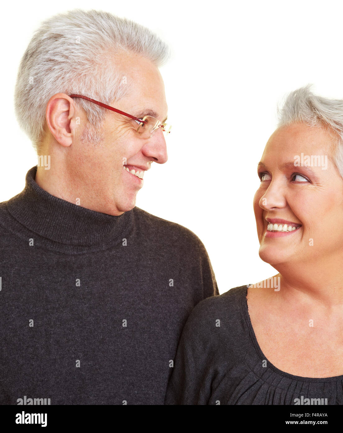 Happy senior citizen couple smiling together Stock Photo - Alamy
