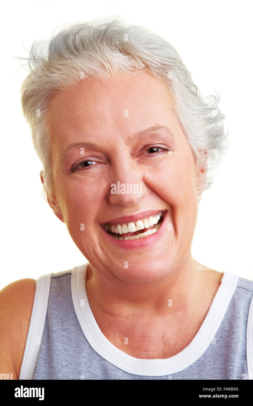 Happy senior woman smiling into the camera Stock Photo - Alamy