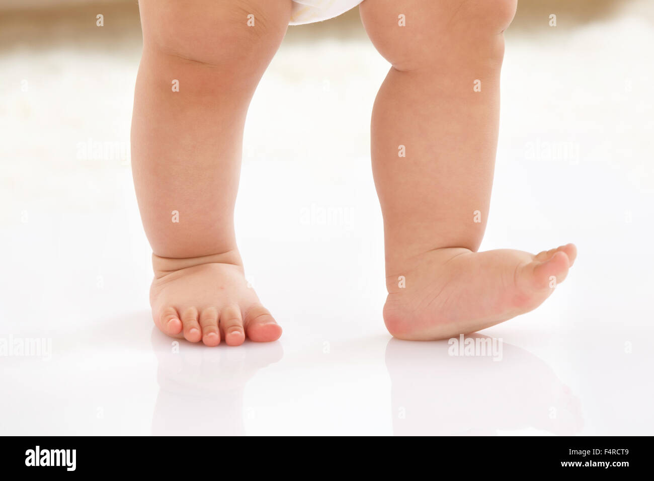 Baby little feet Stock Photo - Alamy