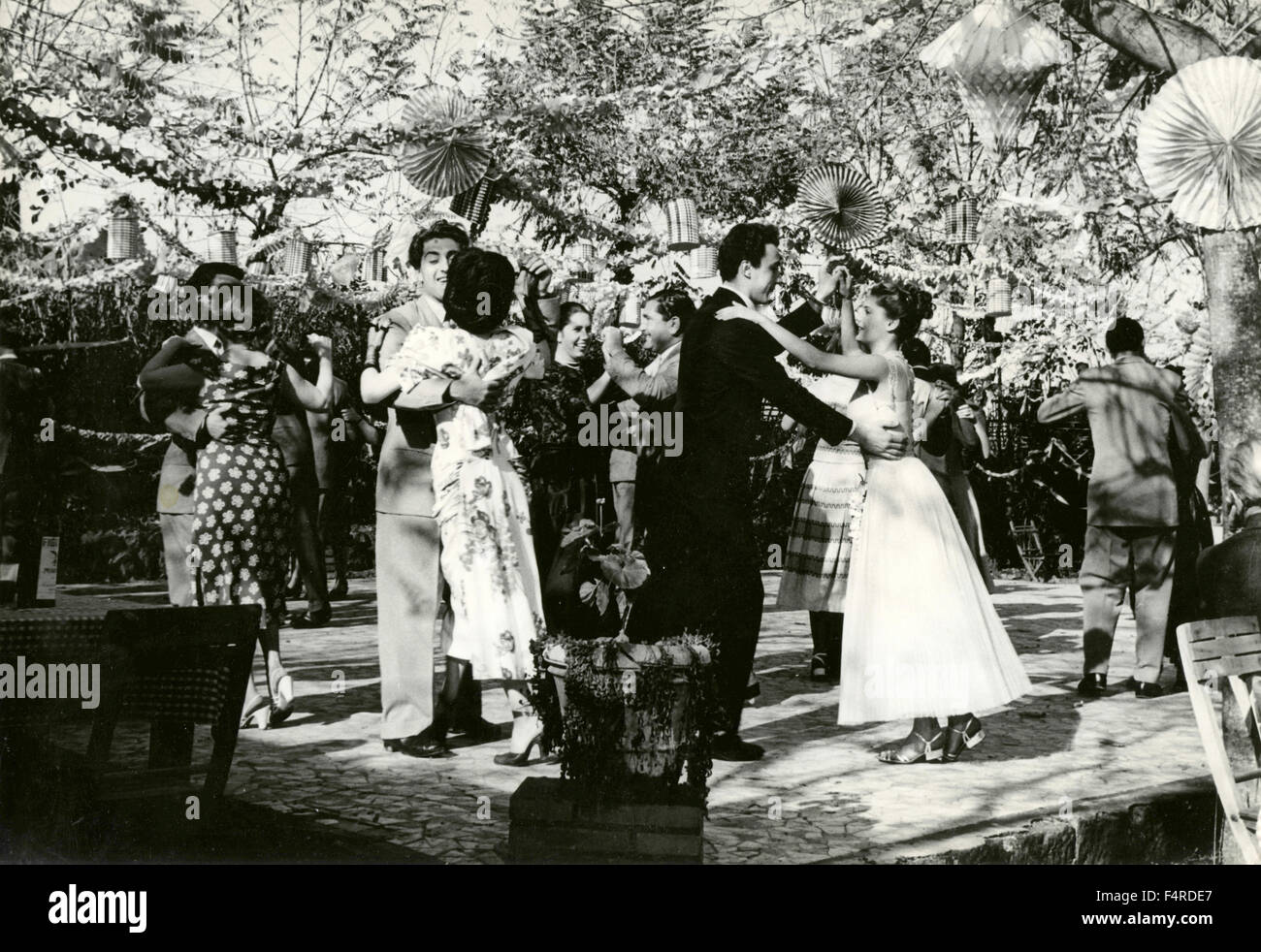 Couples dance in a dance hall outside, Italy Stock Photo - Alamy
