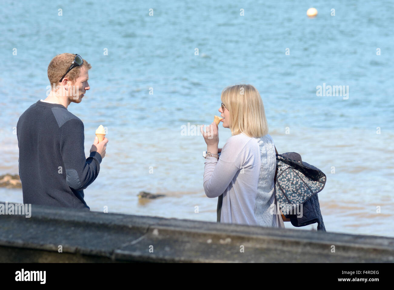 Couple man woman holiday eat ice cream hi-res stock photography and ...
