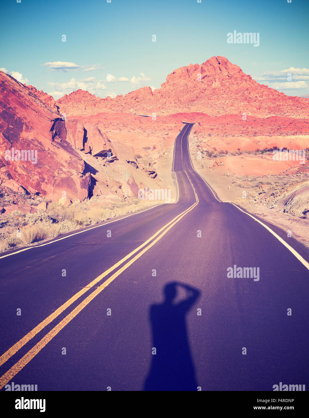 Vintage toned shadow of a photographer in the Valley of Fire, Nevada ...