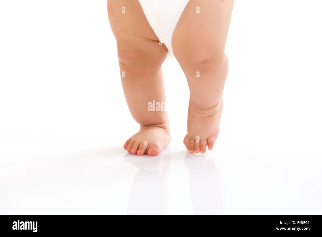 Baby little feet Stock Photo - Alamy
