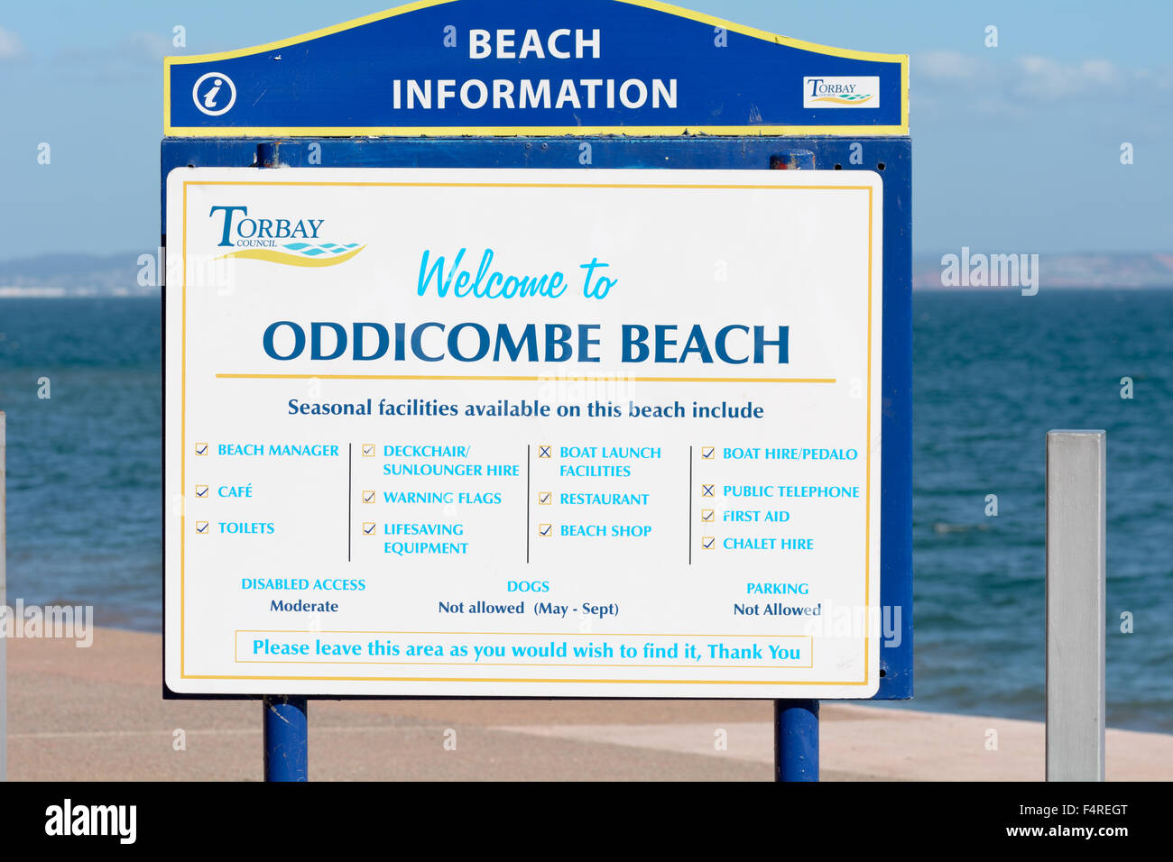 Welcome to Oddicombe Beach information sign with list of 'do's and don ...