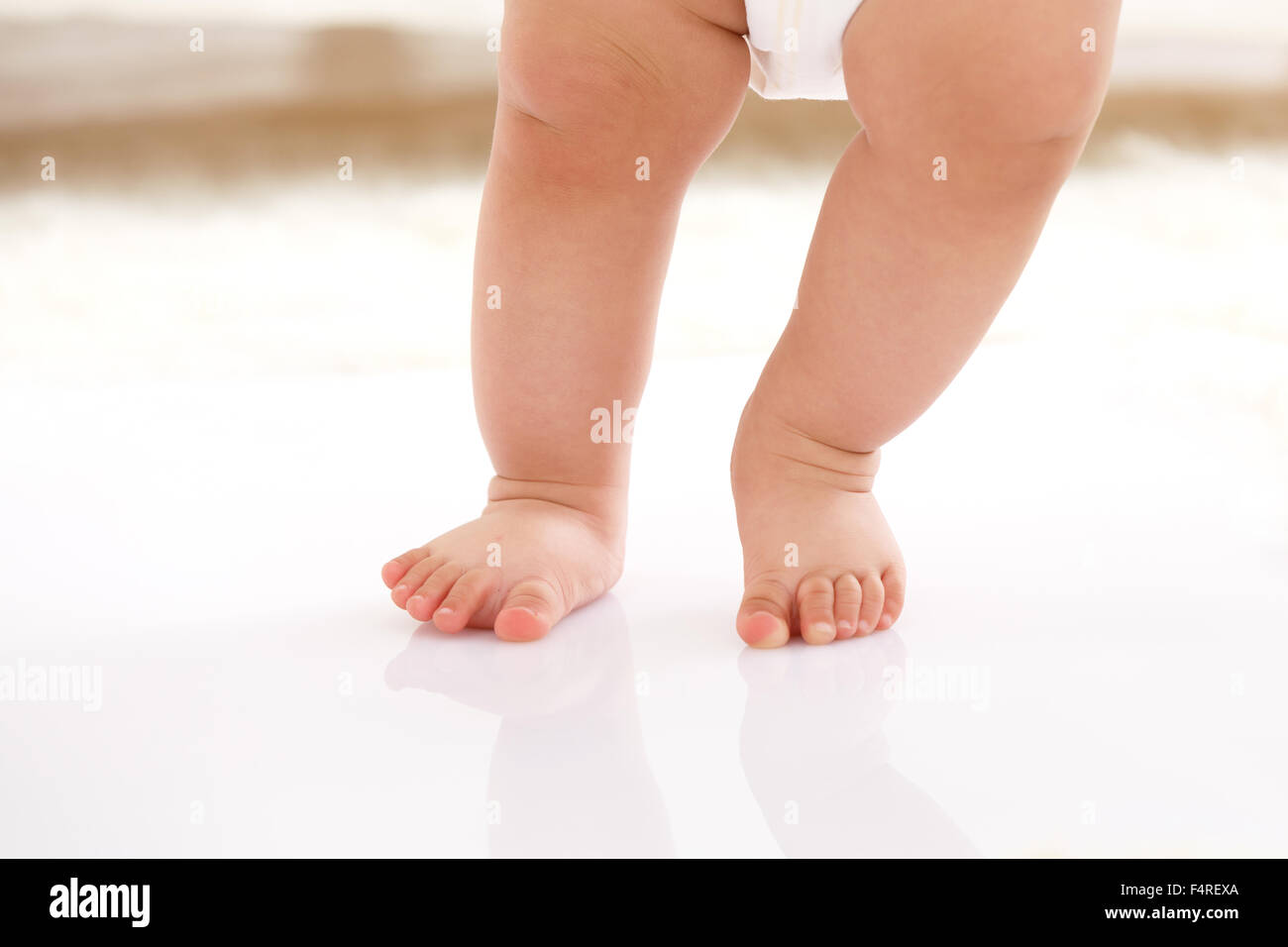 Baby little feet Stock Photo - Alamy