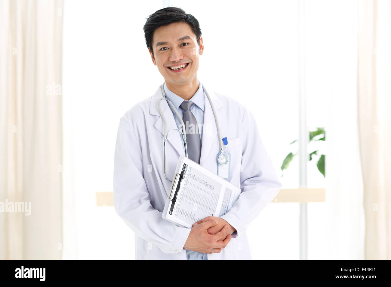 Doctor medical record card hi-res stock photography and images - Alamy