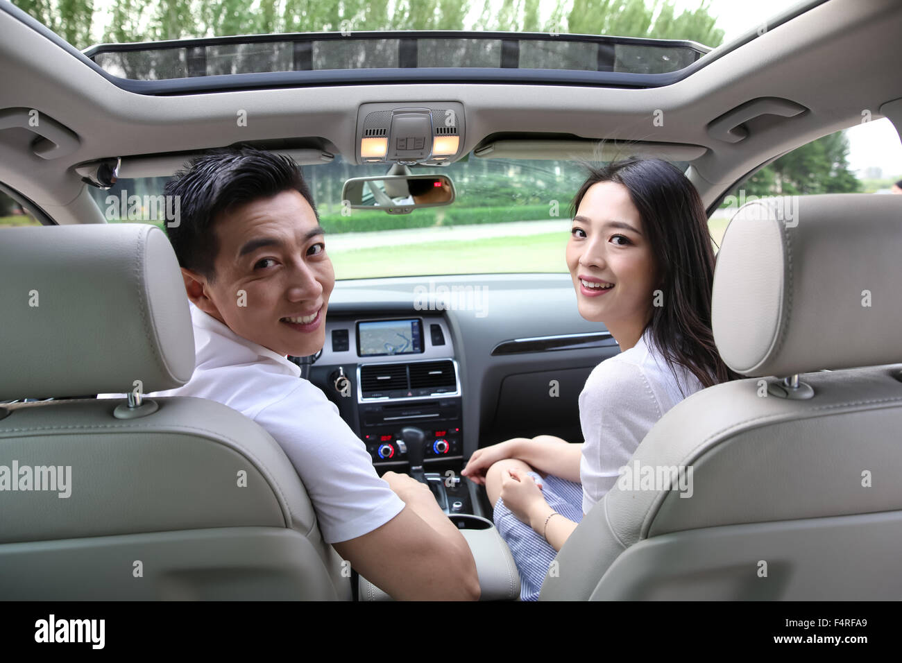 Young couples drive car hi-res stock photography and images - Alamy