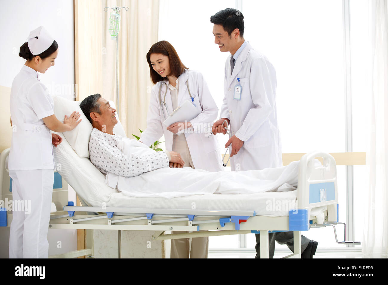 Doctors and patients in the ward Stock Photo - Alamy