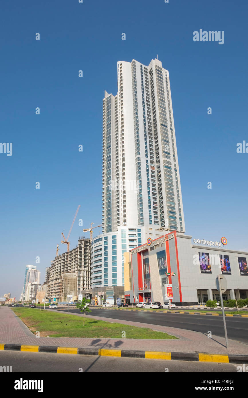 View of street and high-rise Corniche Tower along Corniche in Ajman ...
