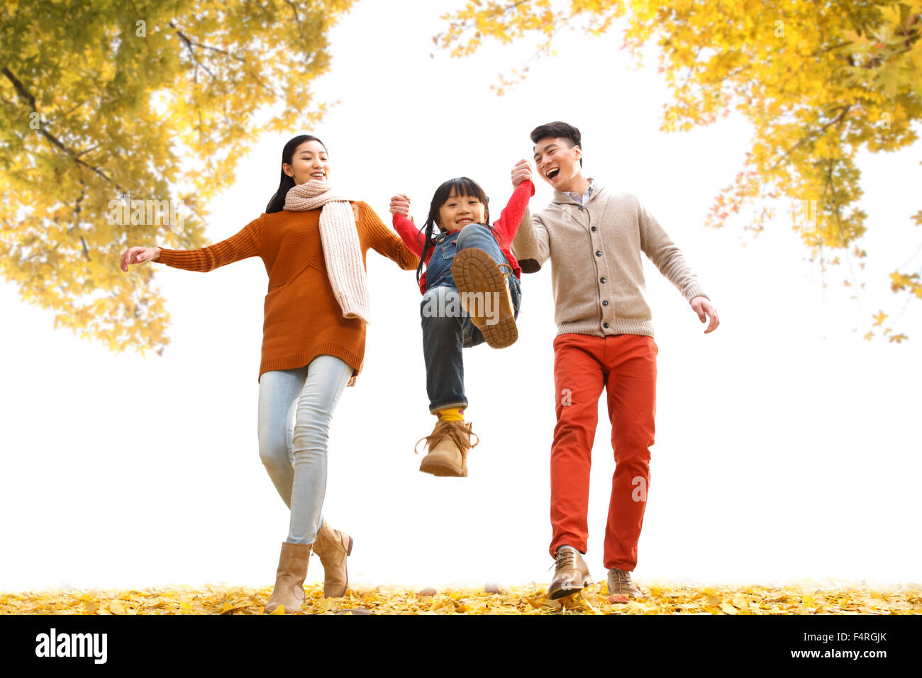 Happy family outdoor play Stock Photo - Alamy