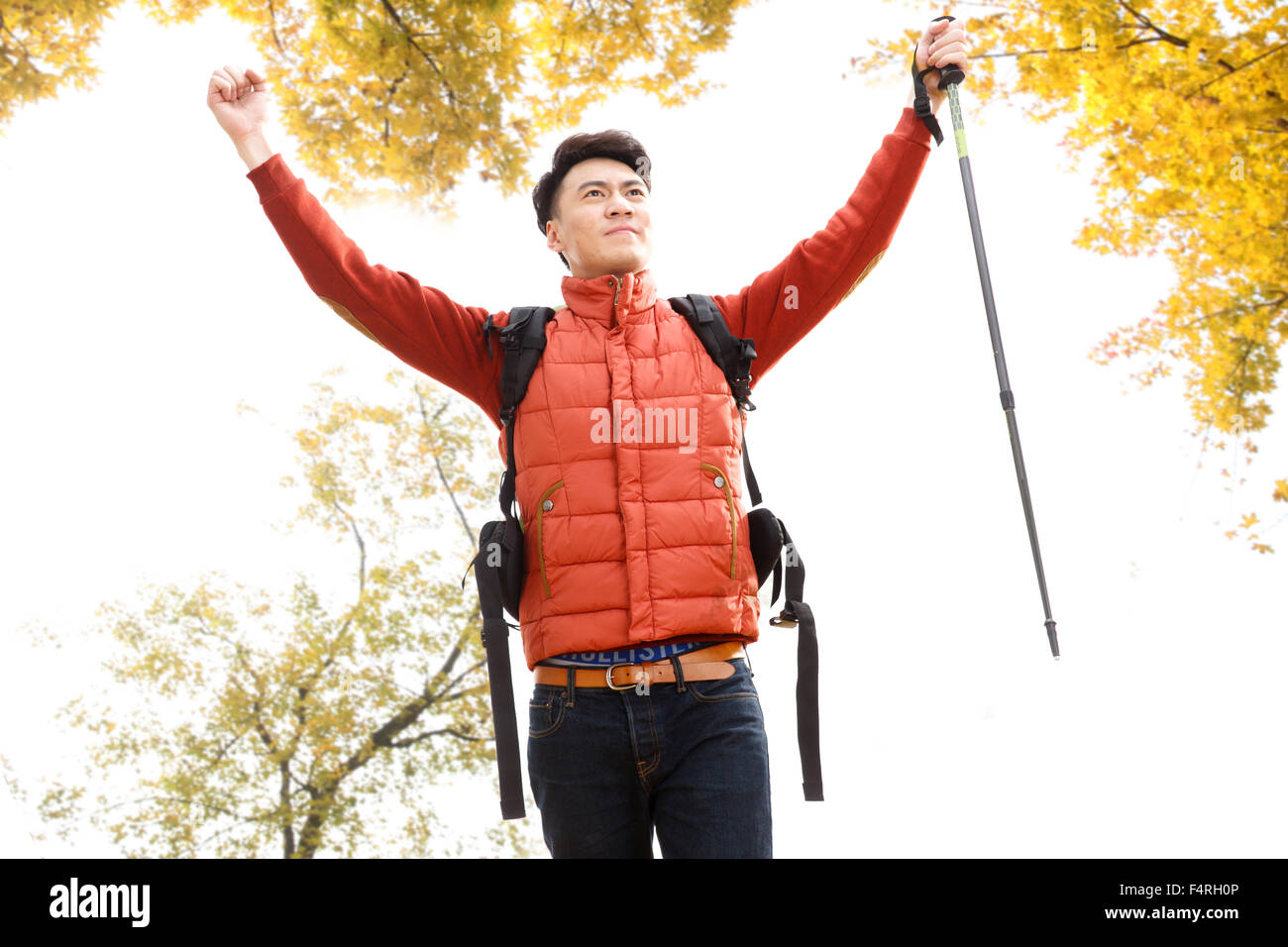 Young men climbing Stock Photo - Alamy