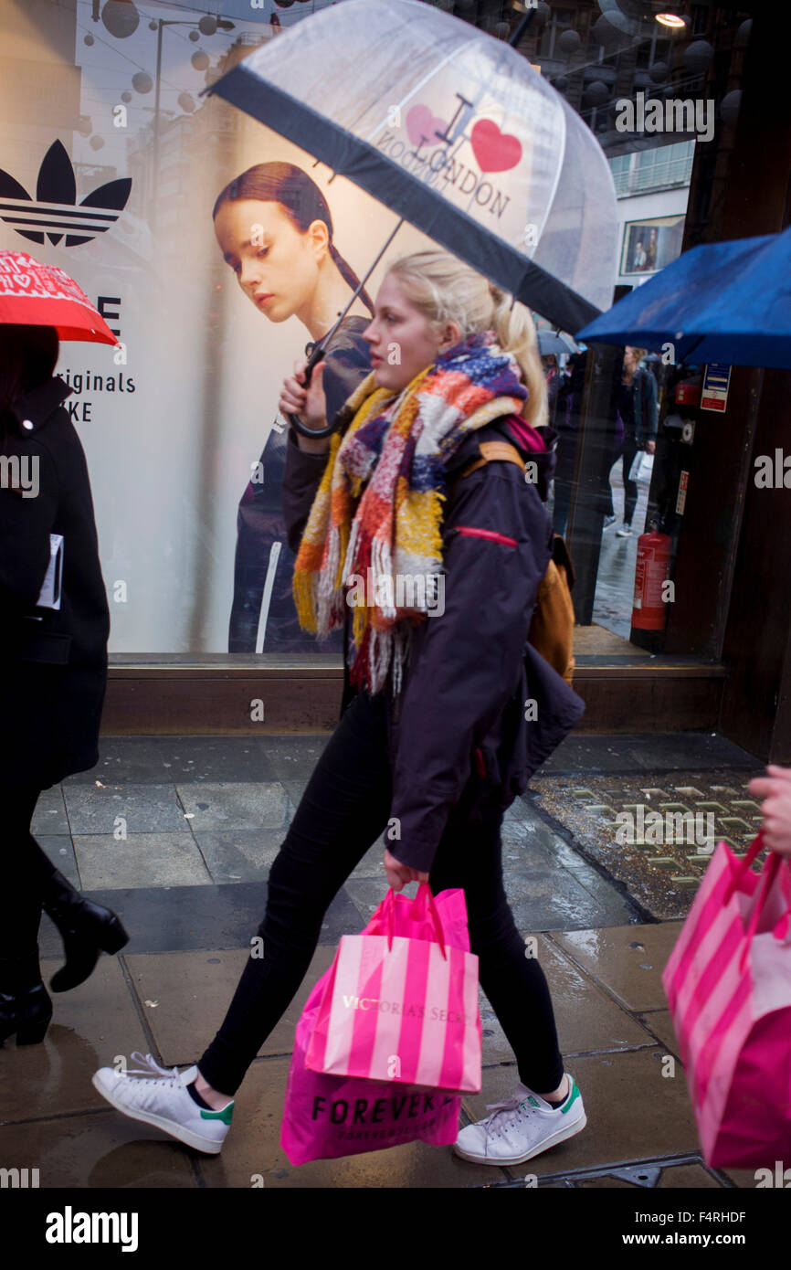 Model on an Adidas seemingly looks over her shoulder to watch young ...