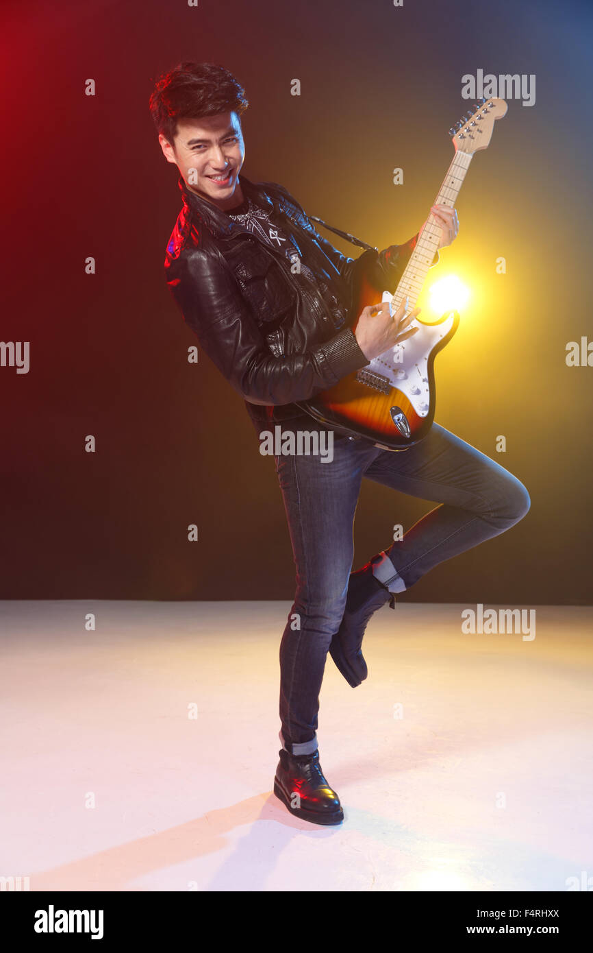 Young men singing in the bar Stock Photo - Alamy