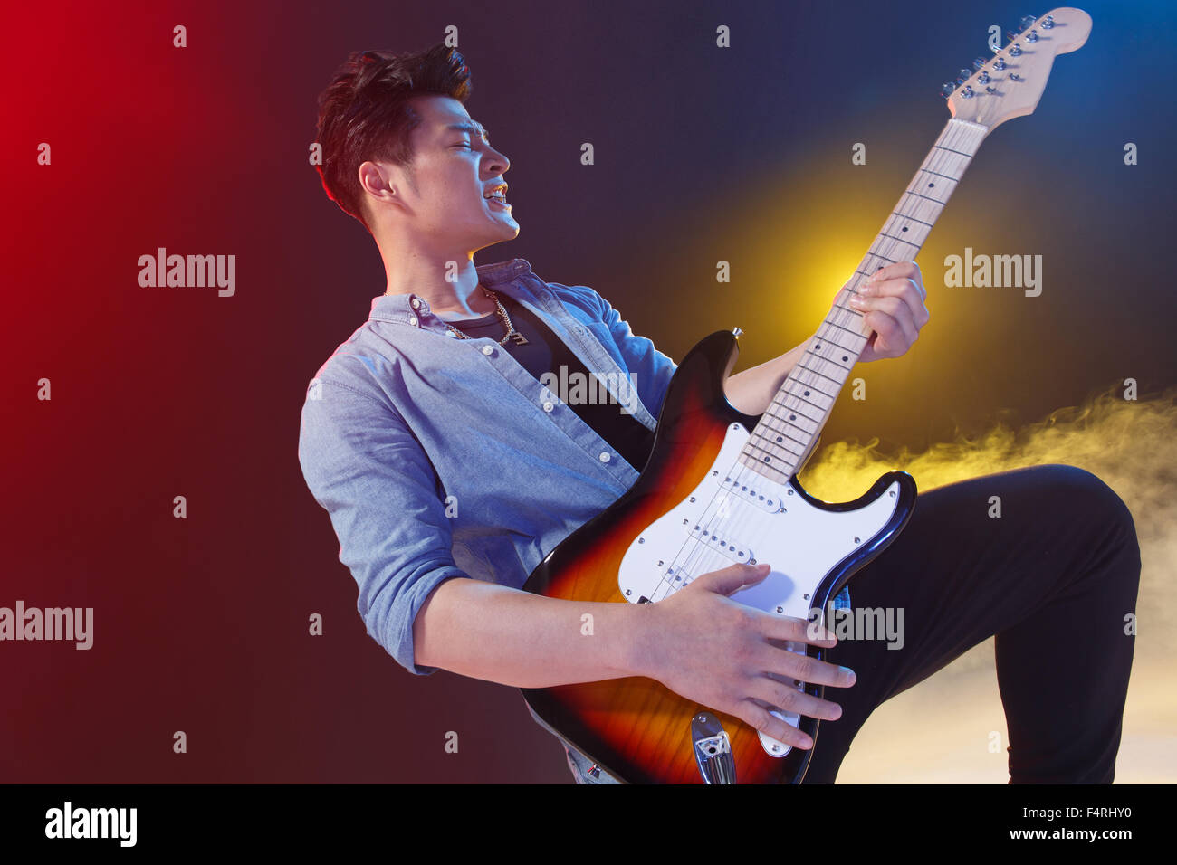 Young men singing in the bar Stock Photo - Alamy