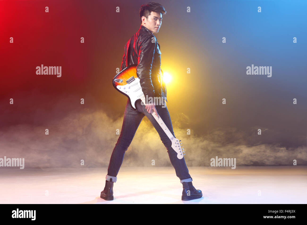Rear view young man guitar hi-res stock photography and images - Alamy