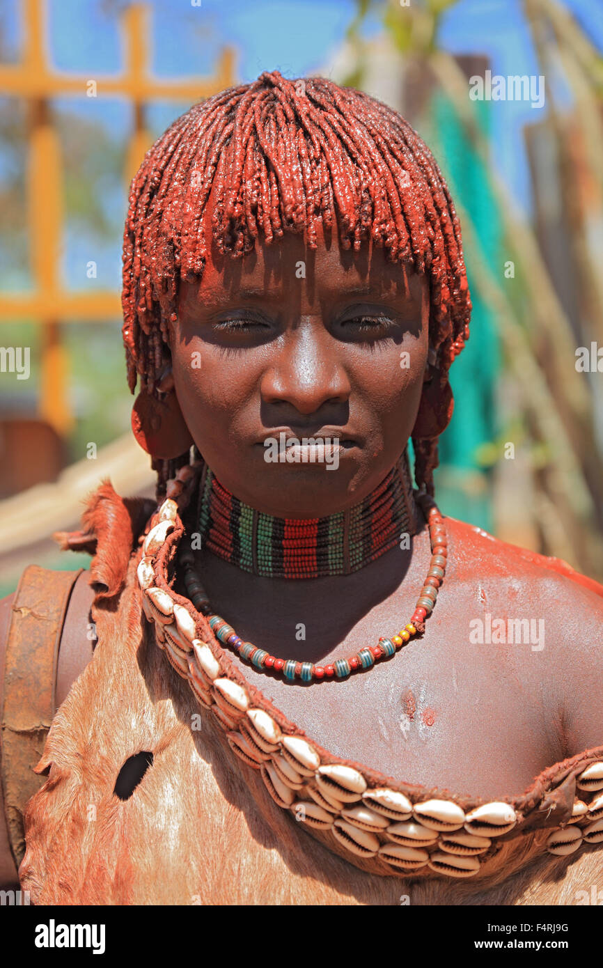 Woman from the people of the hammer tribe in Dimeka, dress made of goat ...