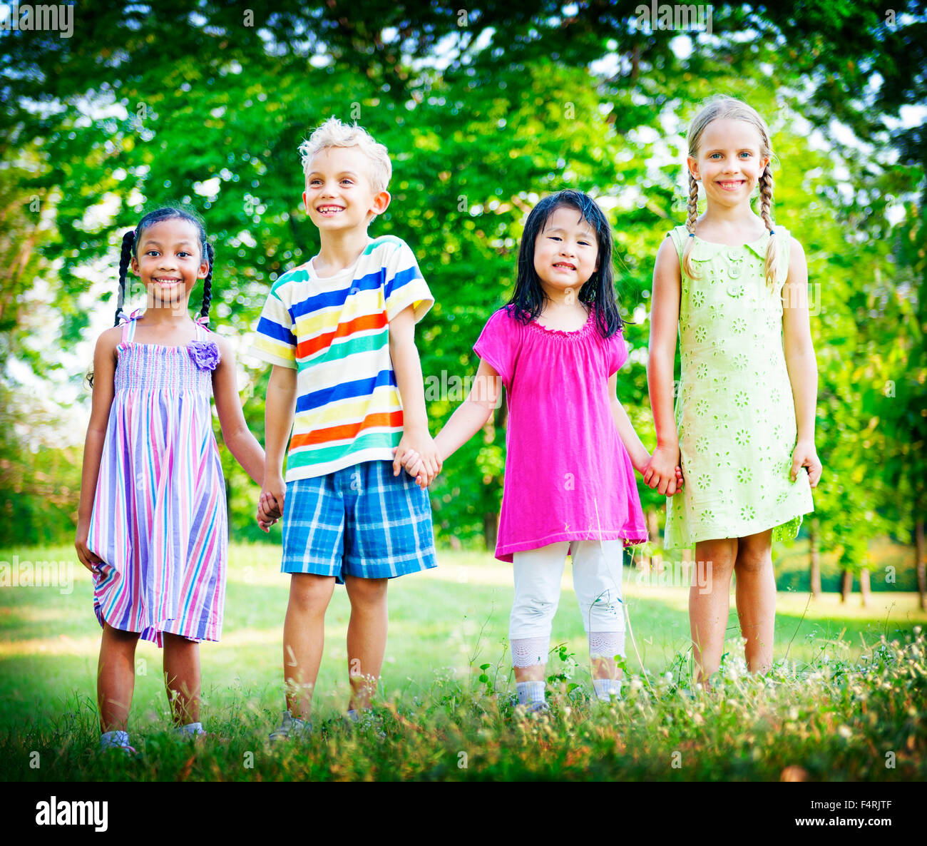 Friendship Children Kids Playing Outdoors Concept Stock Photo - Alamy