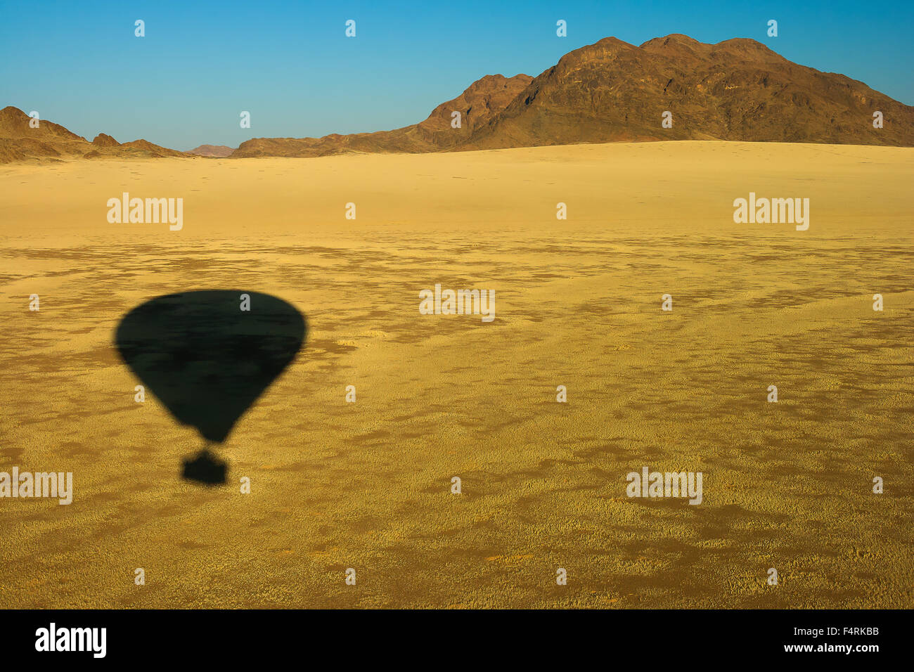 Balloon shadow. Hot Air Balloon flying over Sesriem Canyon, Namibia ...