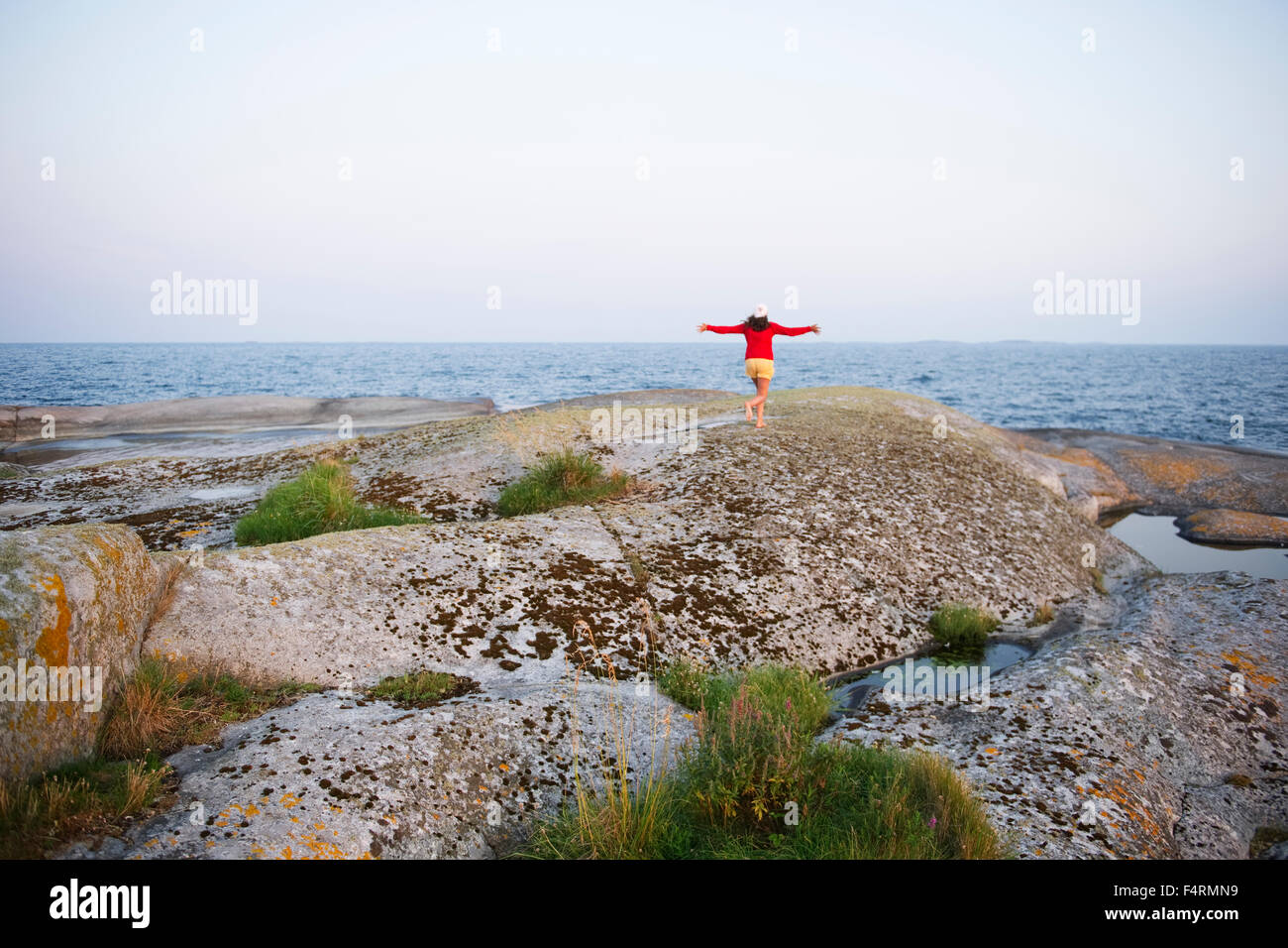 Person standing on one leg hi-res stock photography and images - Alamy