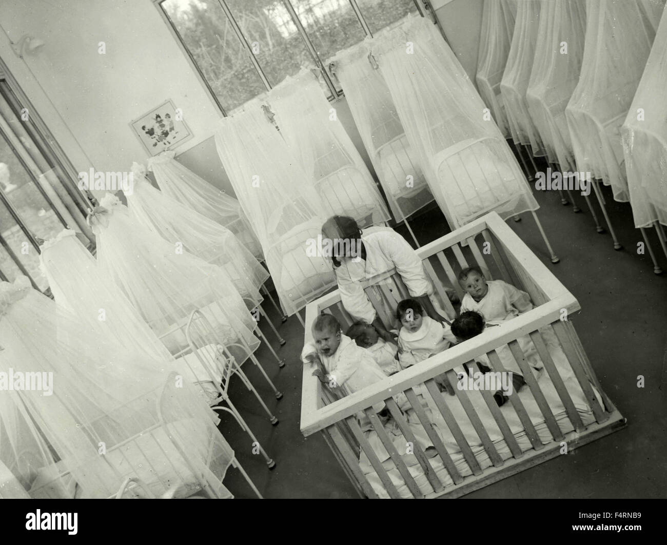 Children in a box in an orphanage hi-res stock photography and images ...