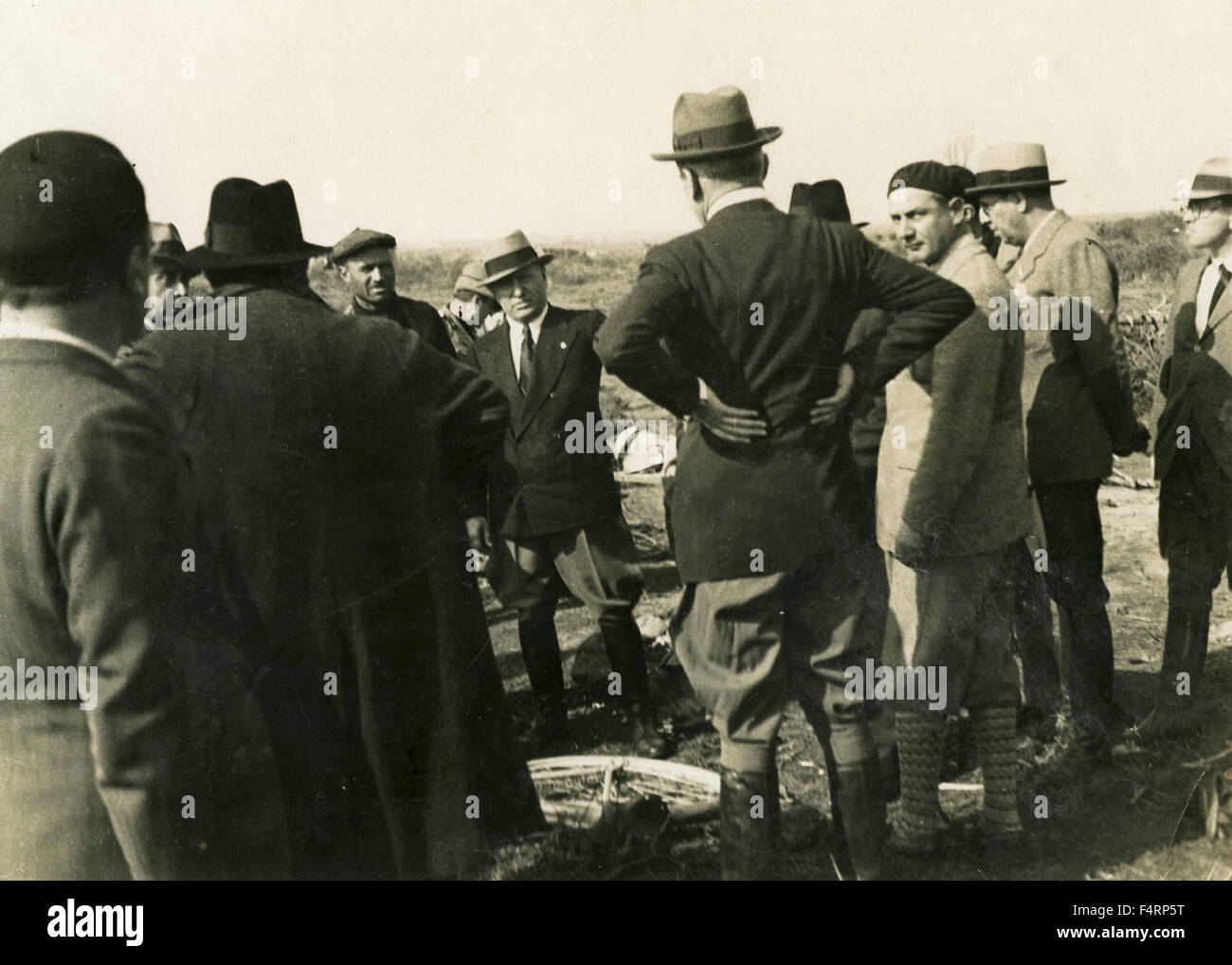 The dictator Benito Mussolini in double-breasted jacket and boots ...