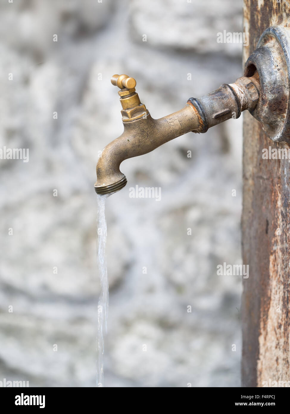 Dripping, drooping, leaking old tap Stock Photo - Alamy