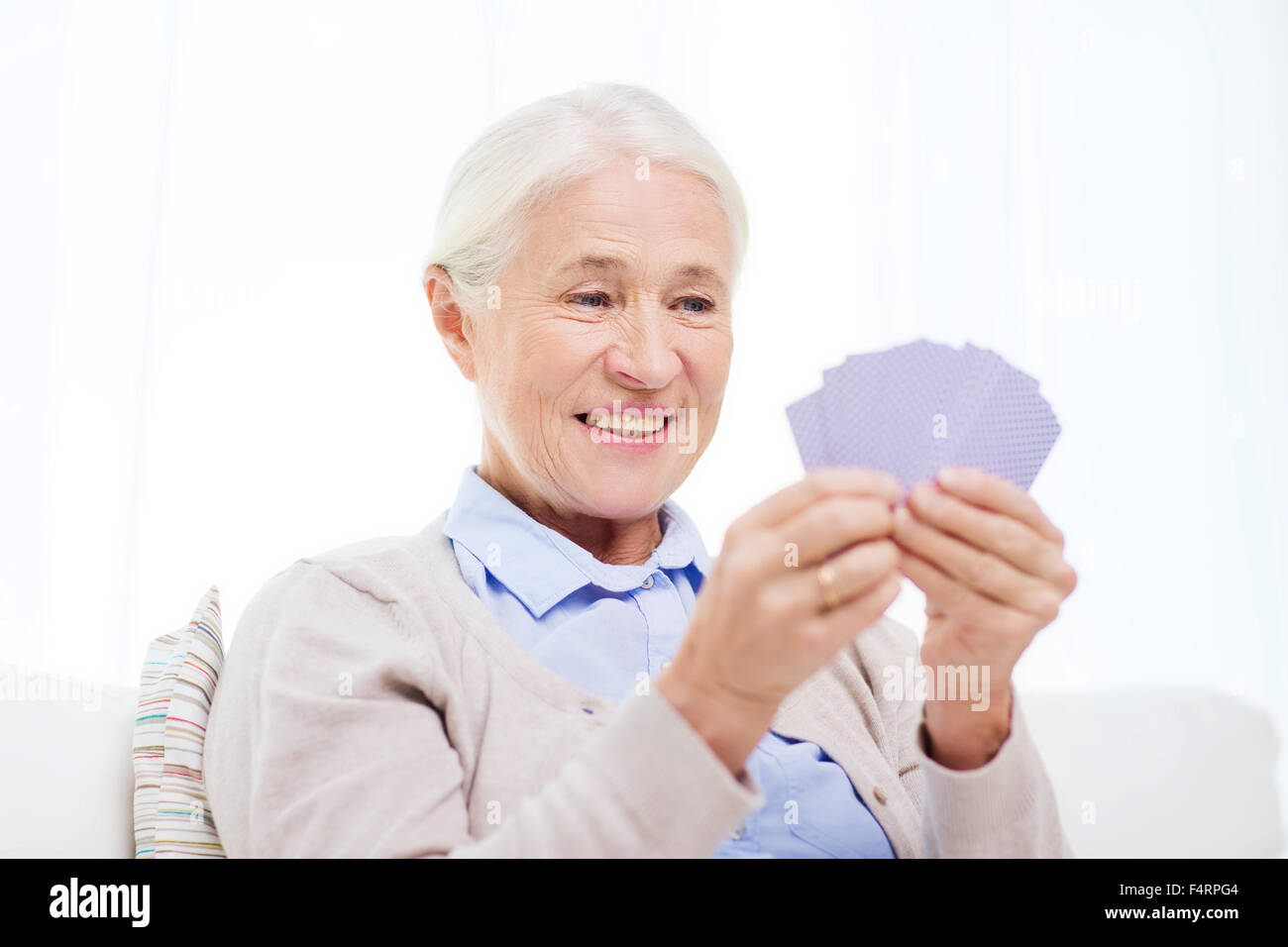 Playing card game at home hi-res stock photography and images - Alamy