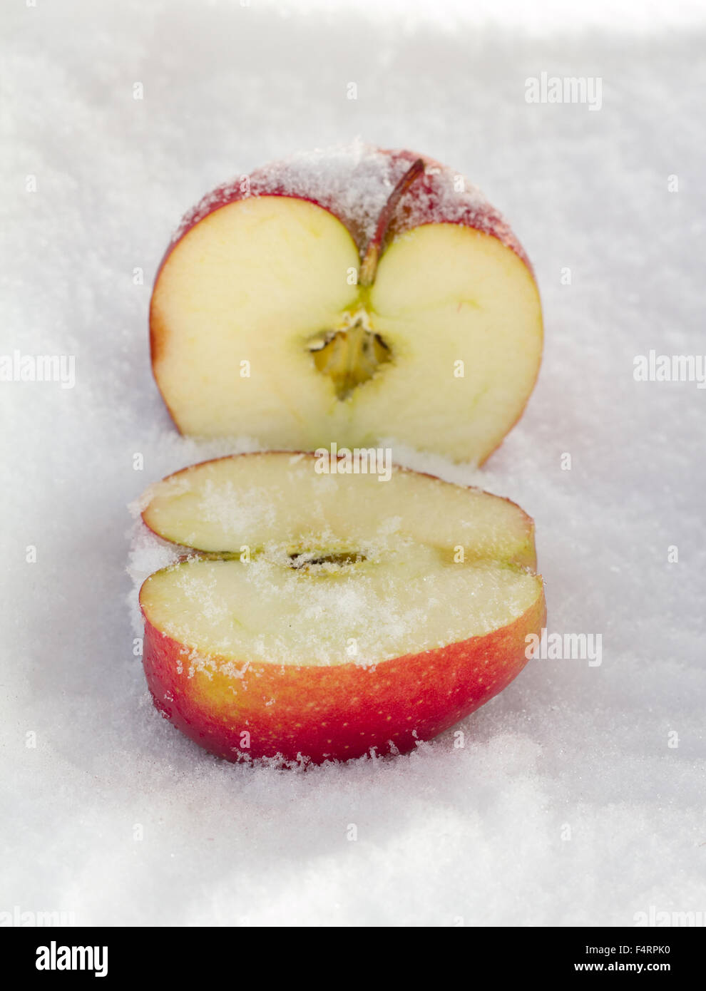 The cooled apple cut on two segments Stock Photo - Alamy