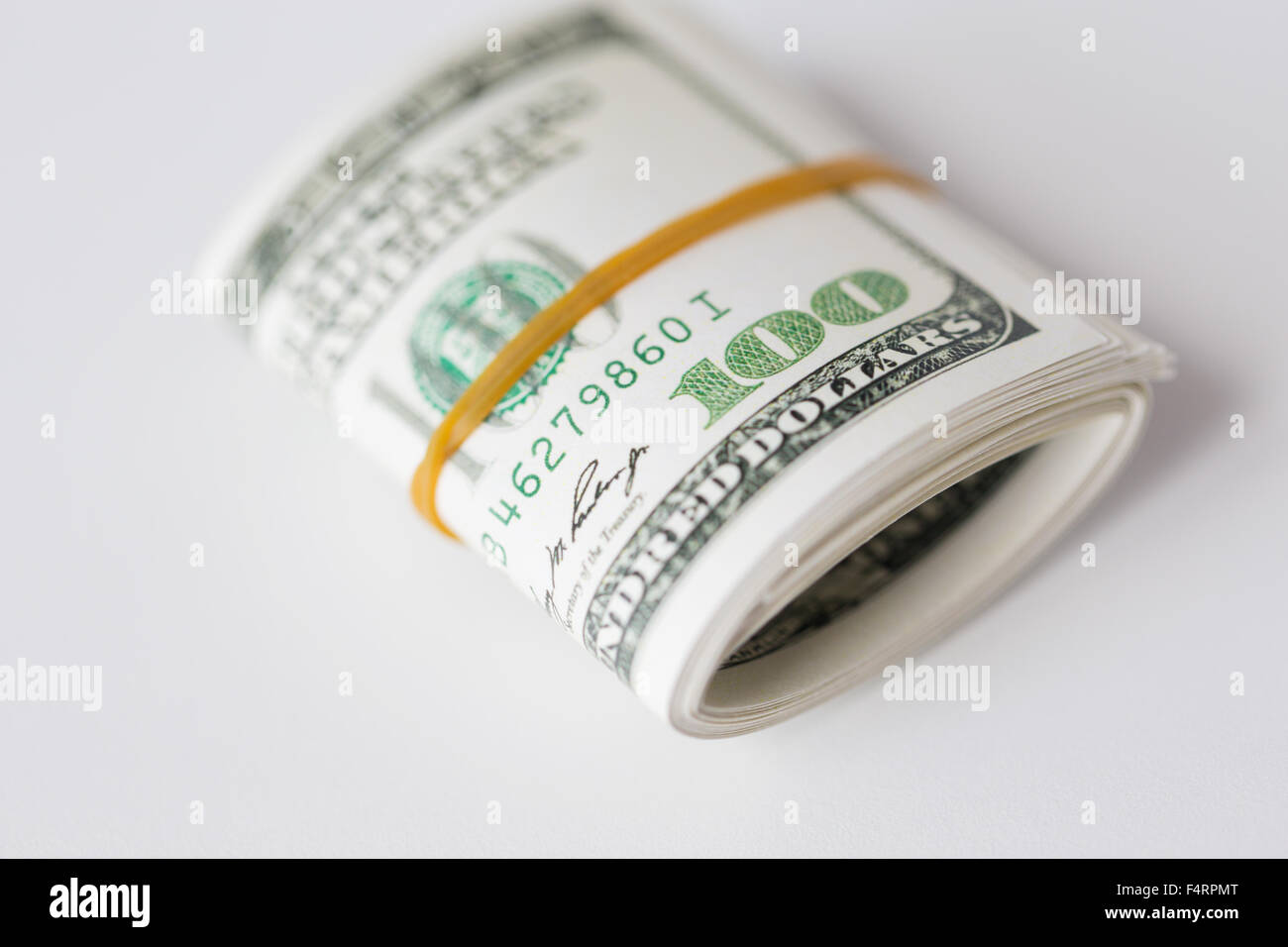 close up of dollar money packet tied with rubber Stock Photo - Alamy
