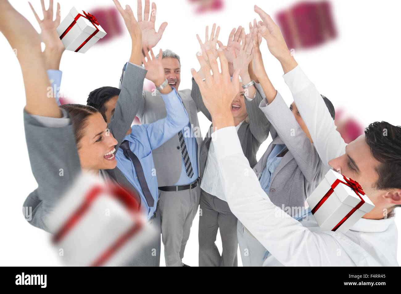 Composite image of business people raising their arms Stock Photo - Alamy