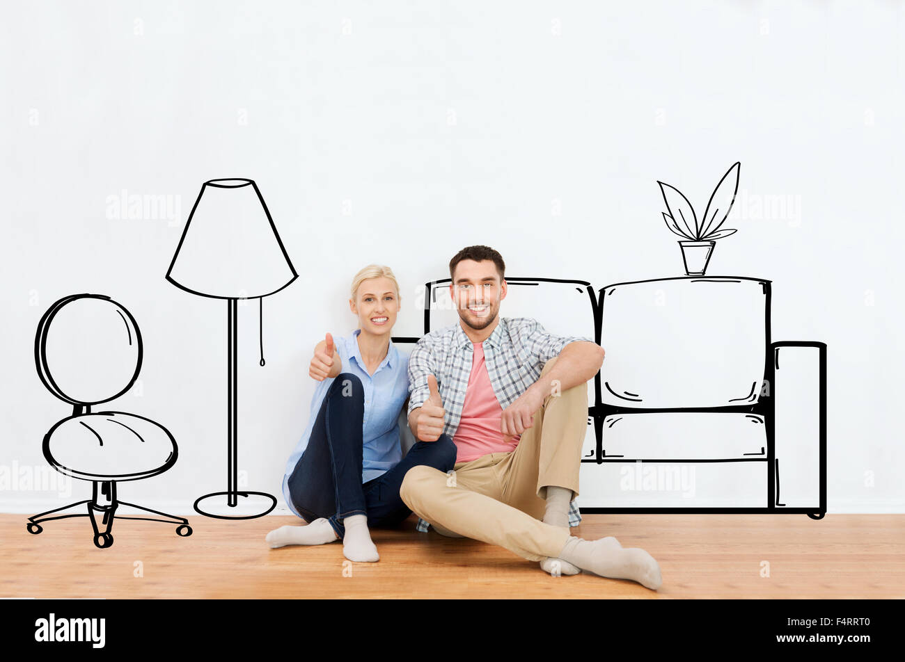 happy couple showing thumbs up at new home Stock Photo - Alamy