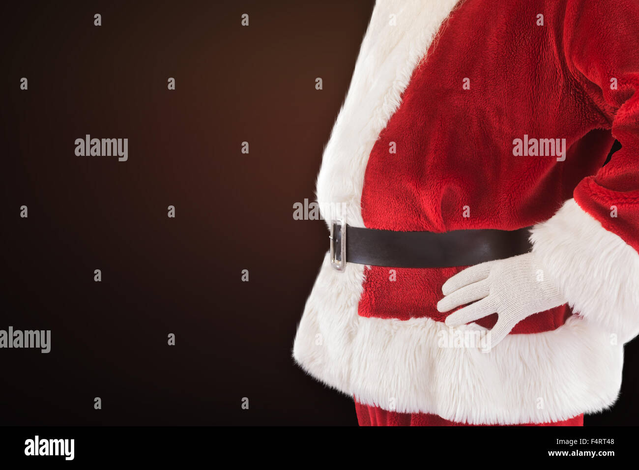 Composite image of santa claus belly from the side Stock Photo - Alamy