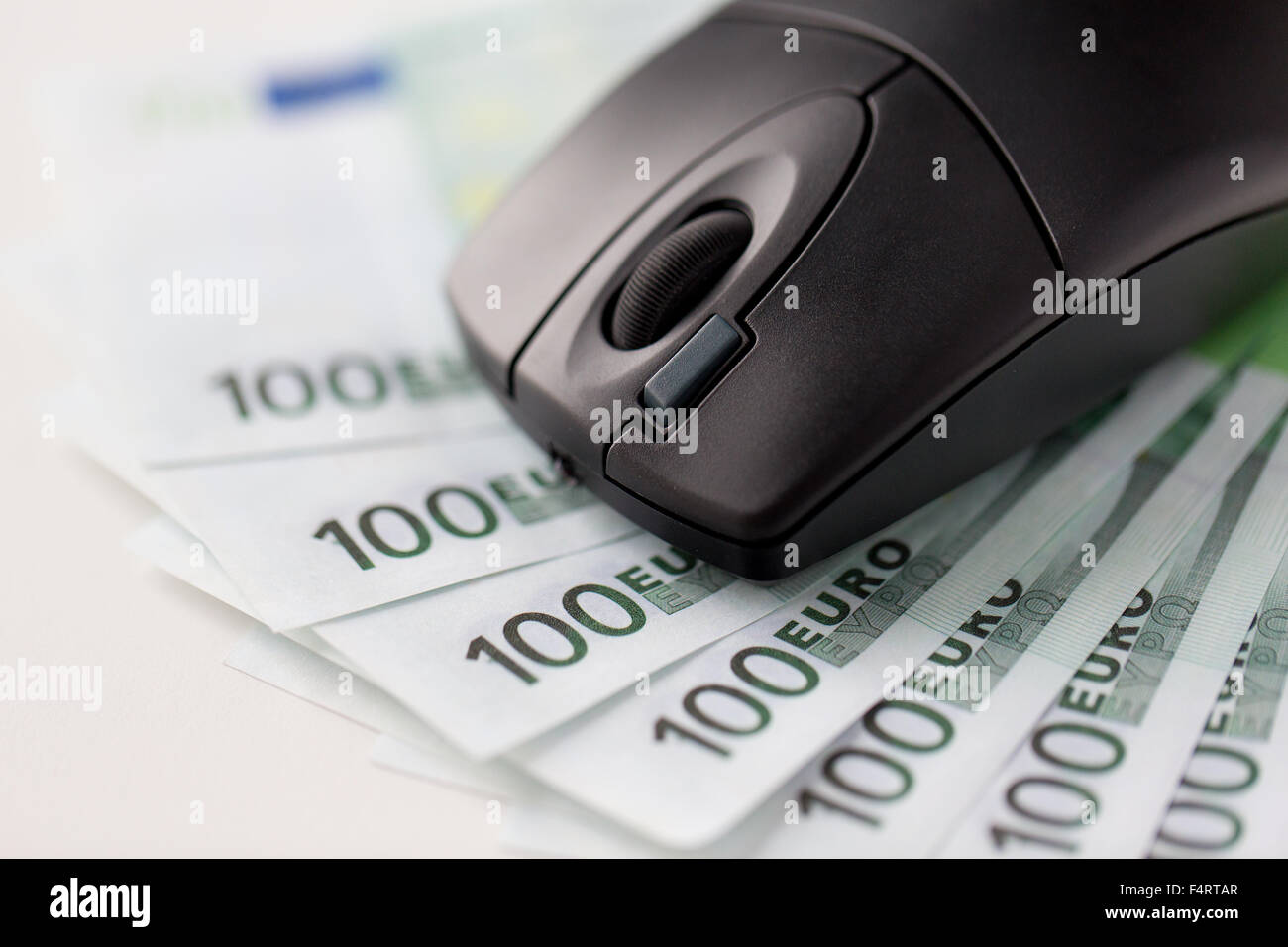 close up of computer mouse and euro cash money Stock Photo - Alamy