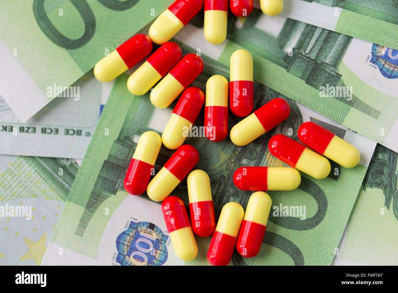 medical pills or drugs and euro cash money Stock Photo - Alamy