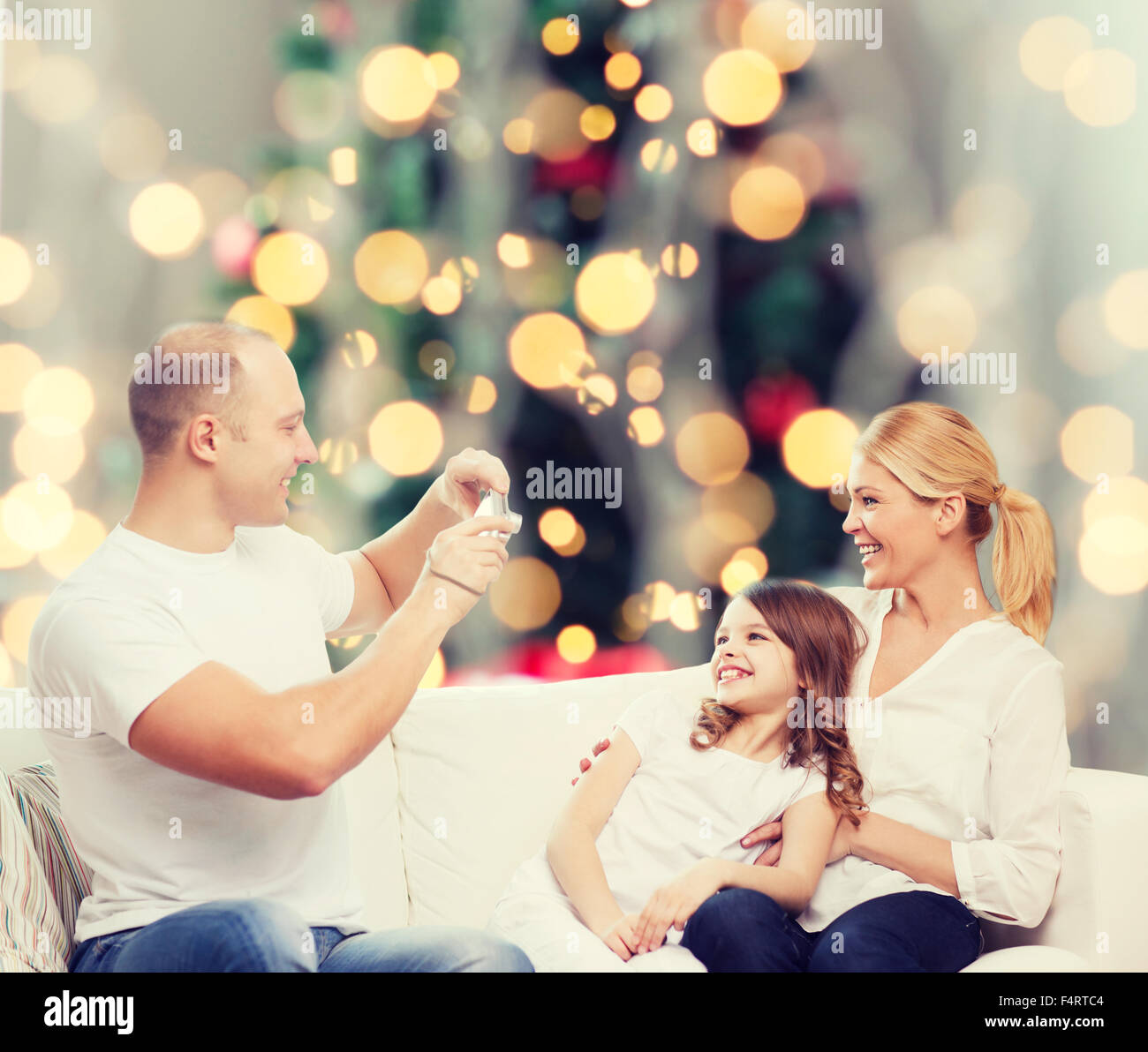 happy family with camera at home Stock Photo - Alamy